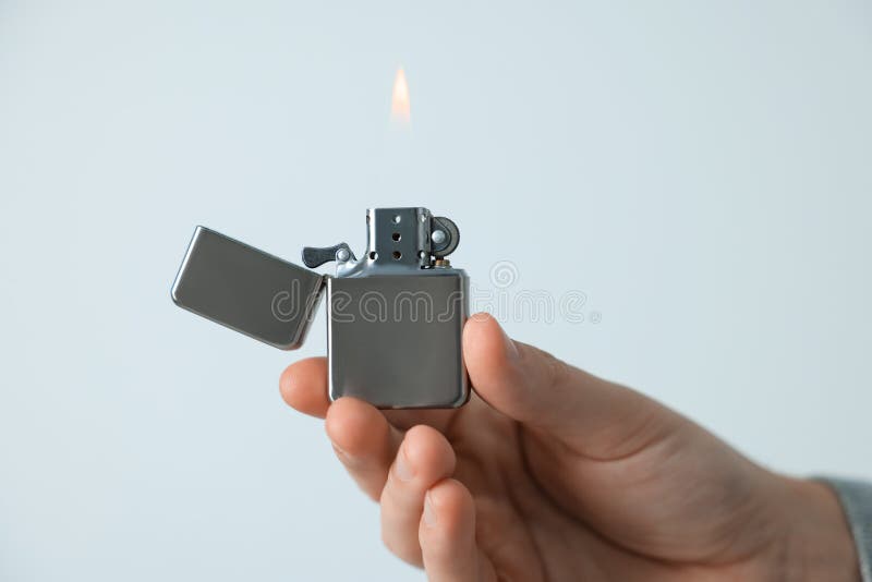 528 Man Holding Lighter Stock Photos - Free & Royalty-Free Stock Photos ...