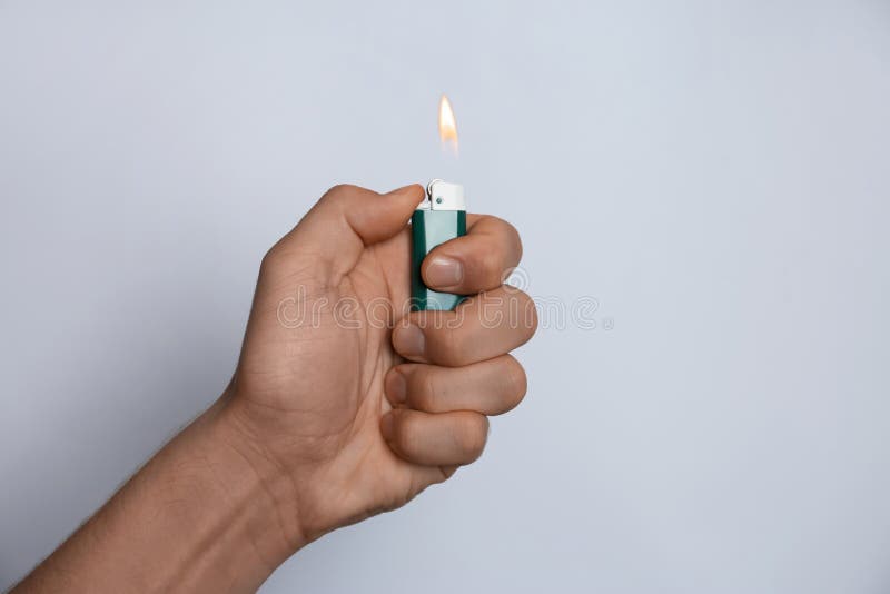 Man Holding Lighter on White Background, Closeup Stock Photo - Image of ...