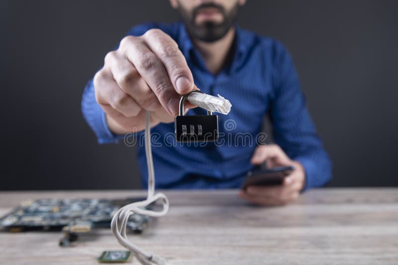 Man Holding Lock and Technology Cable Stock Photo - Image of equipment ...
