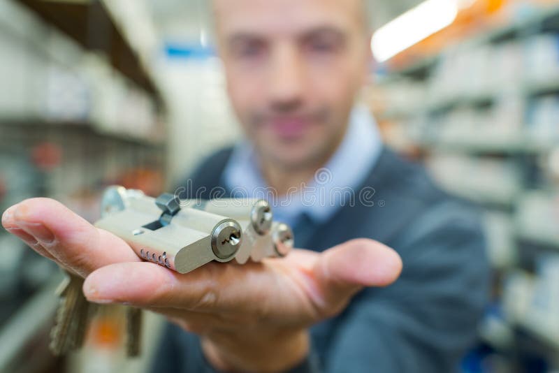 Man holding a locker stock photo. Image of lock, apartment - 148699418