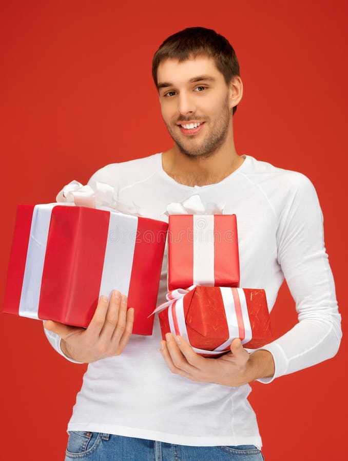 Man Holding Many Gift Boxes Stock Image - Image of looking, holding ...