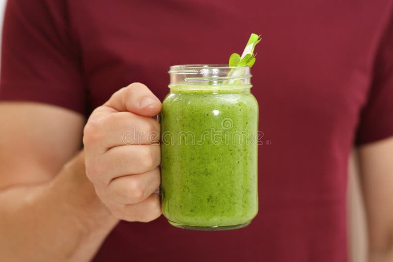 Man Holding Mason Jar with Delicious Smoothie, Closeup Stock Image ...
