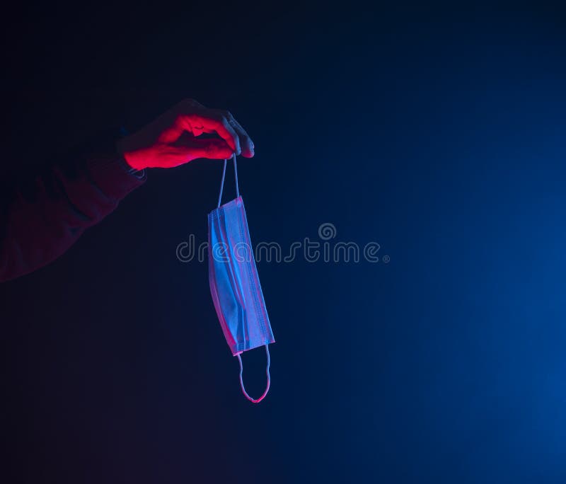 Man Holding Medical Face Mask in Hand Stock Image - Image of pandemic ...