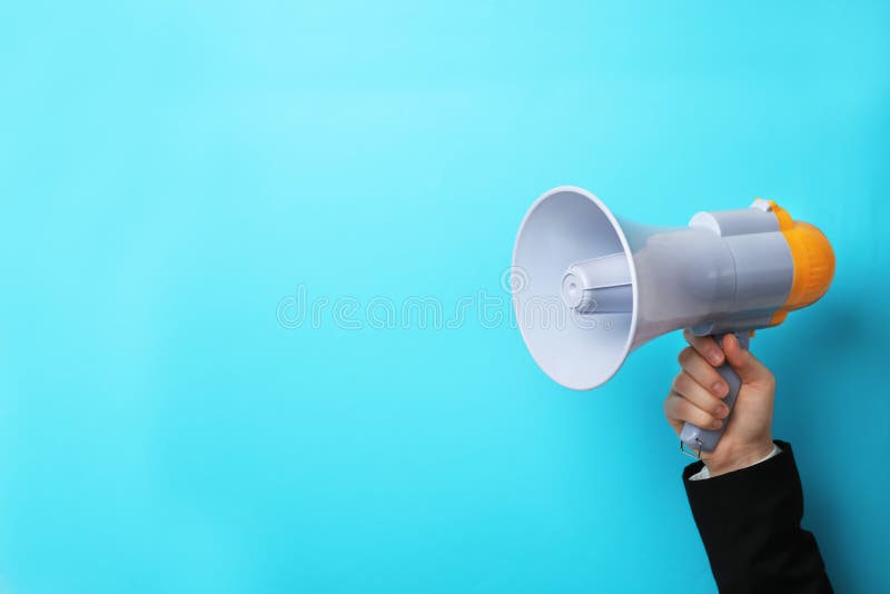 Man holding megaphone stock photo. Image of noise, blue - 114171768