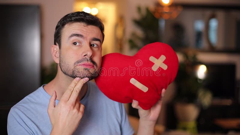 Man holding a mended heart stock video. Video of condition - 363646155