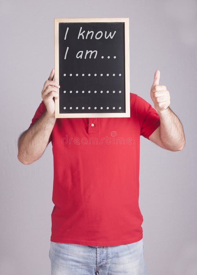 Man Holding Message Written on a Blackboard Stock Photo - Image of ...