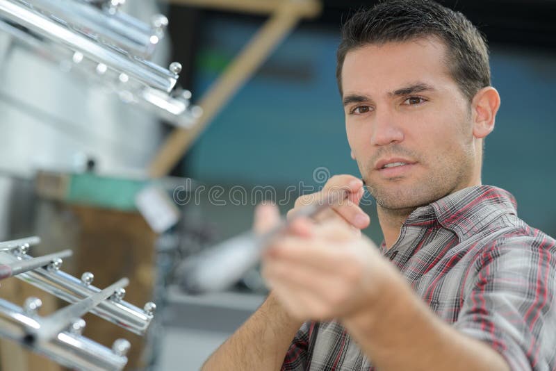 Man holding metal bar stock image. Image of horizontal - 103619205