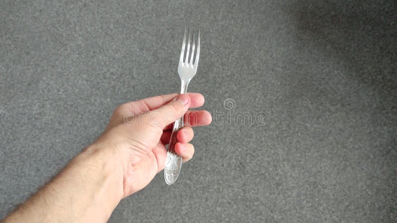 Man Holding a Metal Fork in Left Hand Stock Photo - Image of clean ...