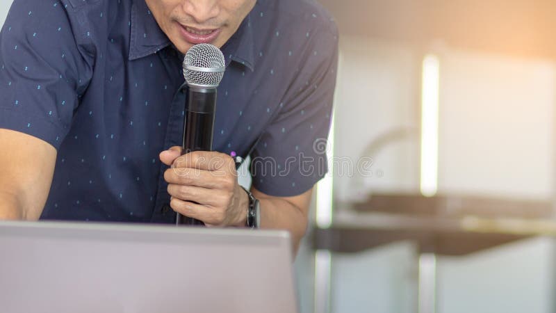 Man Holding Microphone for Lecturing Technical Articles Stock Image ...