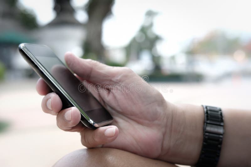 Man Holding Mobile Phone. Hand Texting Message, Using App with S Stock ...