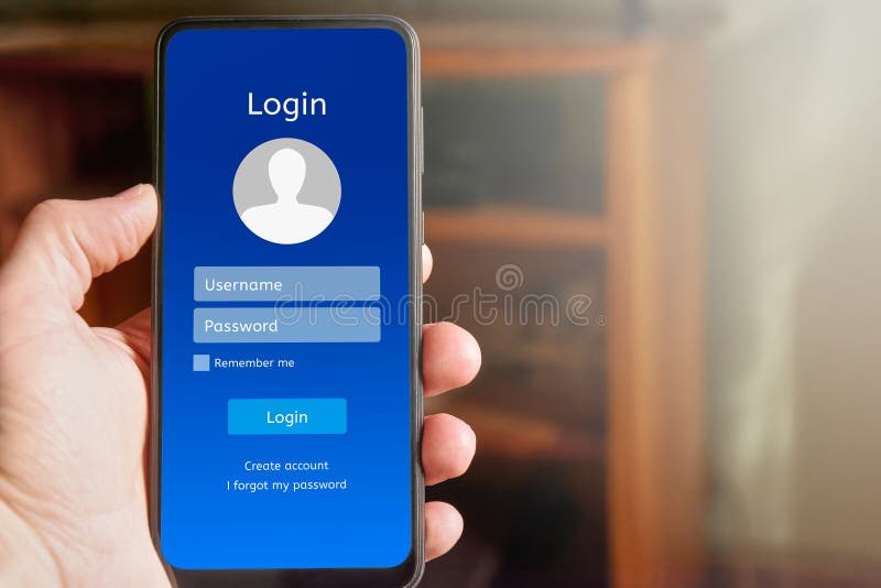 Man Man Holding Mobile Phone Showing Login Interface on Mobile Phone ...