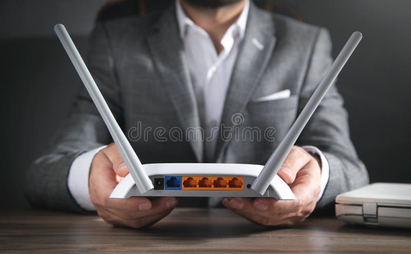 Man Holding Modern Wifi Router Stock Photo - Image of equipment, router ...