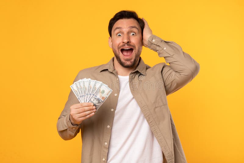 Man Holding Money and Making a Funny Face Stock Image - Image of grin ...