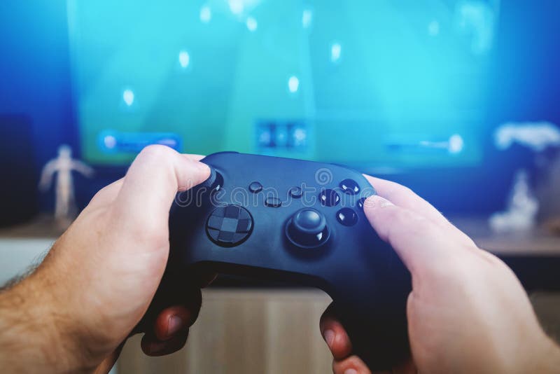 The Guy is Playing on the Console. Stock Photo - Image of room, play ...