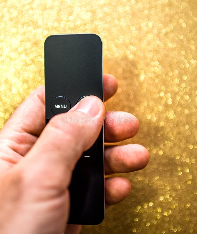 Man Holding New Modern Tiny Thin Remote Control Stock Photo - Image of ...