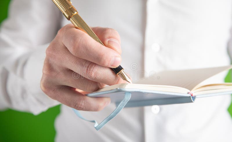 Man Holding Notepad with a Pen Stock Image - Image of worker, holding ...