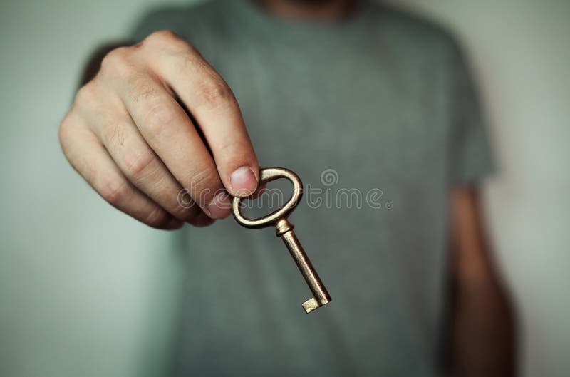 Man holding old key hand stock image. Image of metal - 38525845
