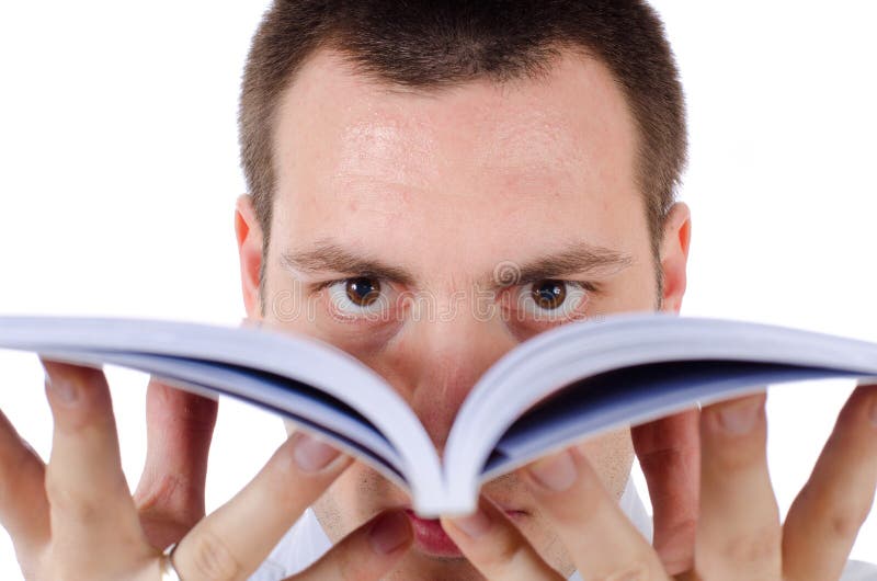 Man Holding an Open Book in Front of His Face Stock Photo - Image of ...
