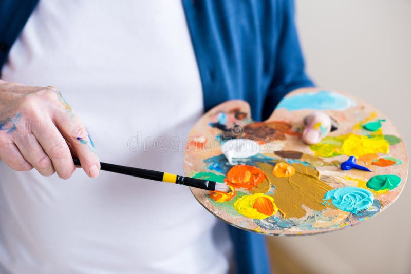 Man Holding Paint Brush and Pallet Stock Image - Image of hands, hobby ...