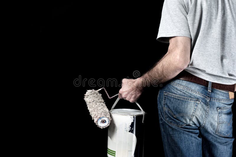 Man Holding Paint Roller and a Bucket of Paint Stock Image - Image of ...