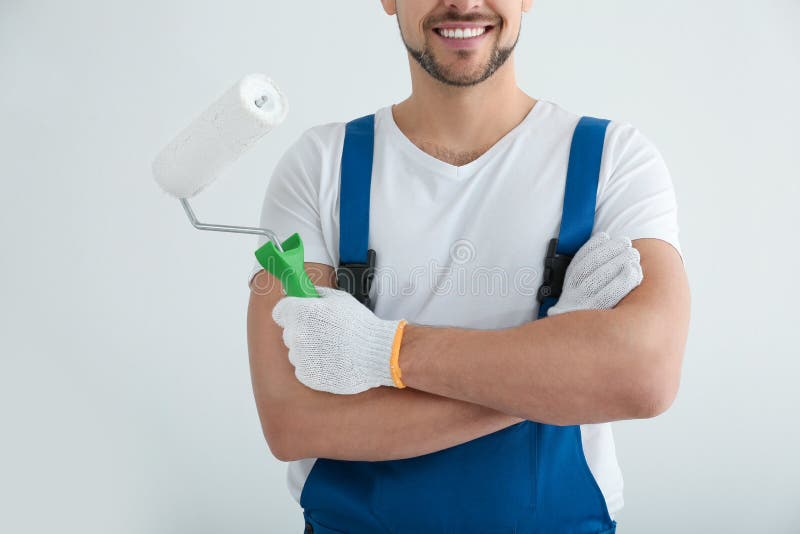Man Holding Paint Roller in Empty Room Stock Photo - Image of empty ...
