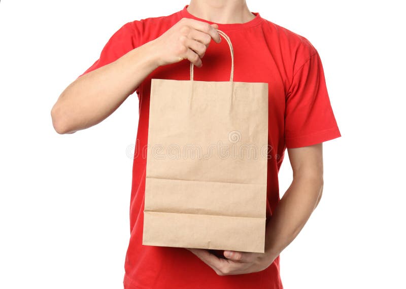 Man Holding Paper Bag on White Background. Stock Photo - Image of ... Man Holding Paper Bag on White Background. Stock Photo - Image of ...