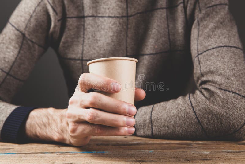 Man holding paper cup stock photo. Image of mockup, cappuccino - 217899084