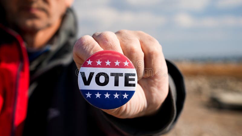 Man is Holding Patriotic Button with Vote Text Stock Photo - Image of ...