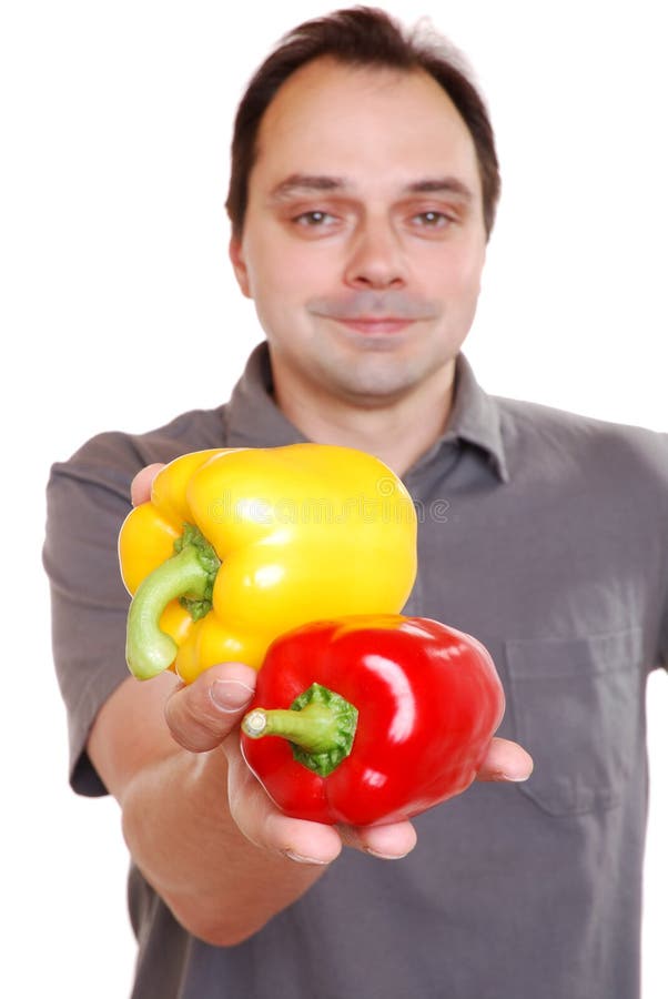 Man holding peppers stock image. Image of freshly, offer - 5589733