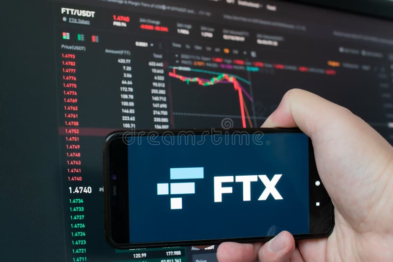 Man Holding Phone with FTX Logo. Global Fall of Cryptocurrency Graph ...