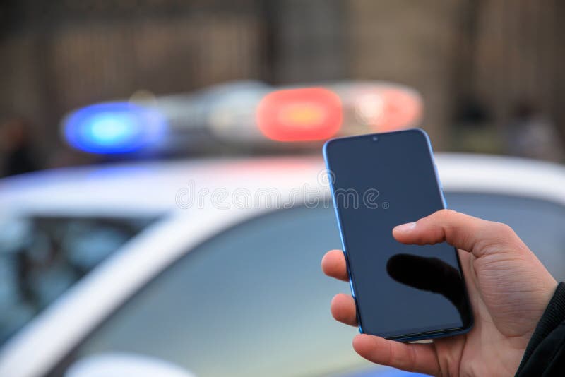 Man Holding Phone with Police Car Stock Image - Image of holding ...