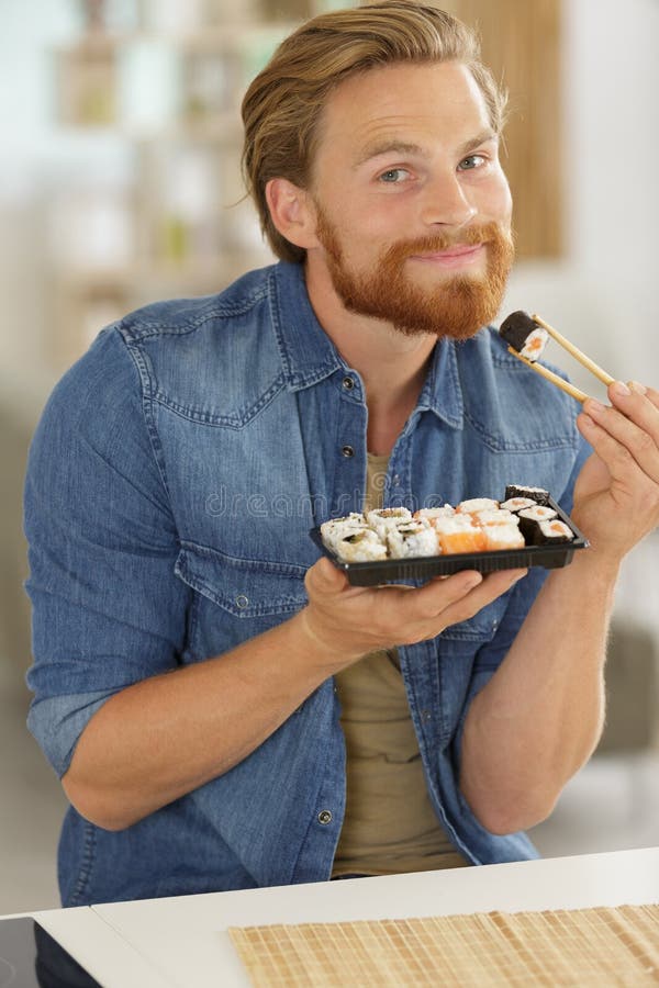 Man holding platter sushi stock image. Image of holding - 197410075