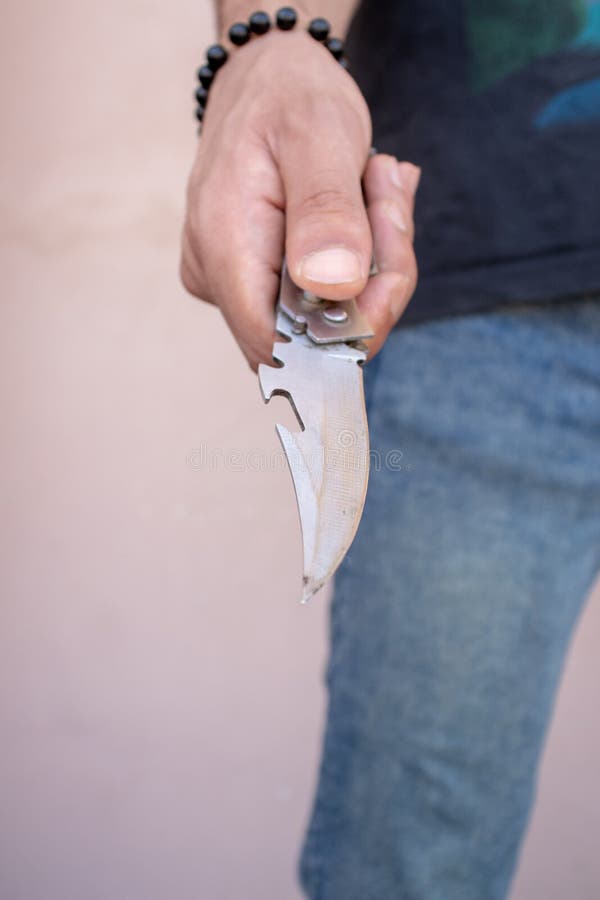 Man Holding Knife Behind Back Stock Photos - Free & Royalty-Free Stock ...