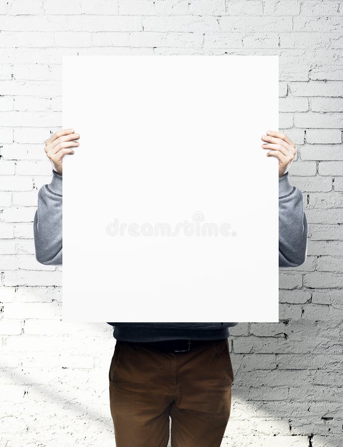 Man holding poster stock image. Image of brick, banner - 59026893