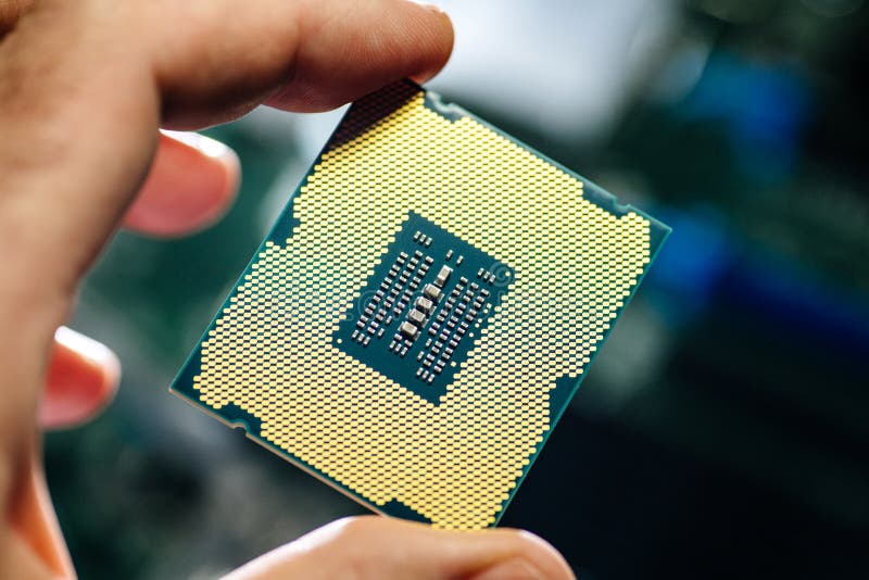 Man Holding Powerful CPU Processor for Computer Stock Photo - Image of ...