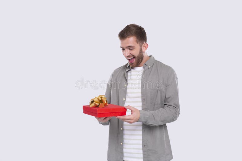 Man Holding Present Over Exceded. Man Holding Gift. Surprise. Gift Box ...