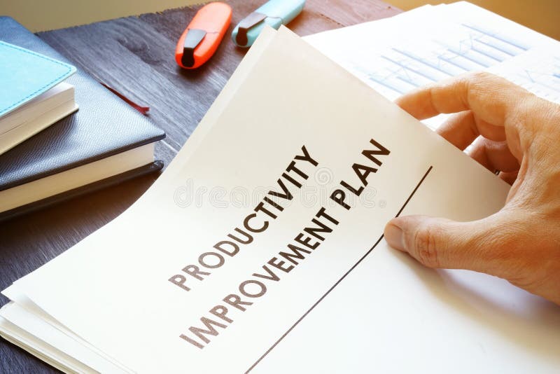 Man is Holding Productivity Improvement Plan Stock Photo - Image of ...