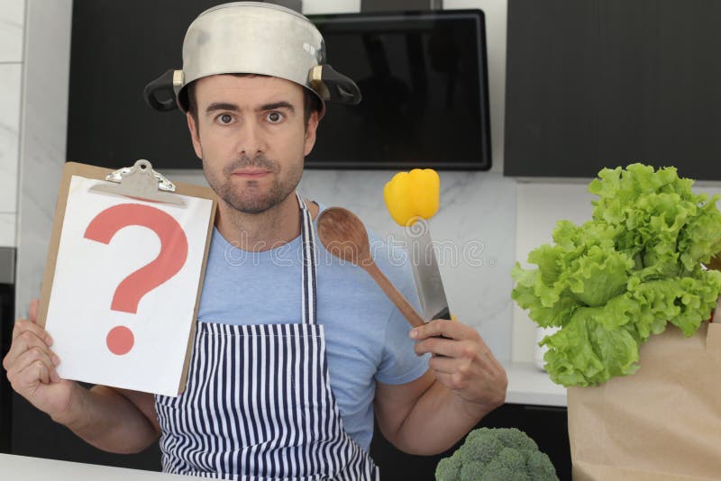 Man Holding Question Mark Sign in the Kitchen Stock Photo - Image of ...