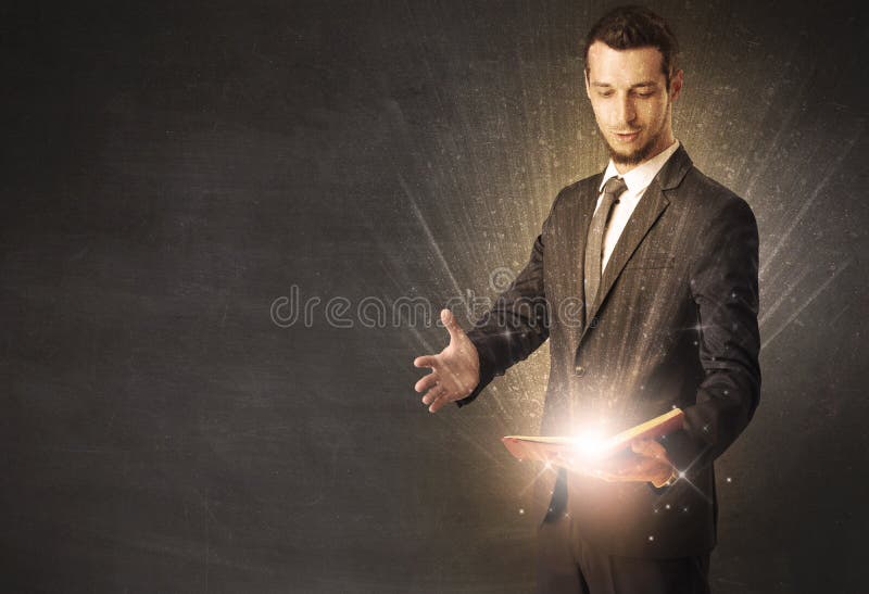 Man holding a book. stock image. Image of look, intellectual - 137181507