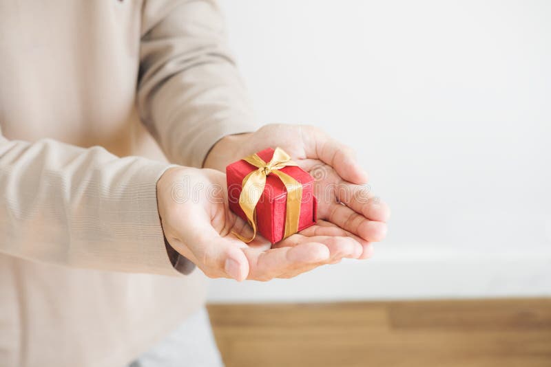 A Man Holding Red Gift Box on Hand Stock Photo - Image of modern ...