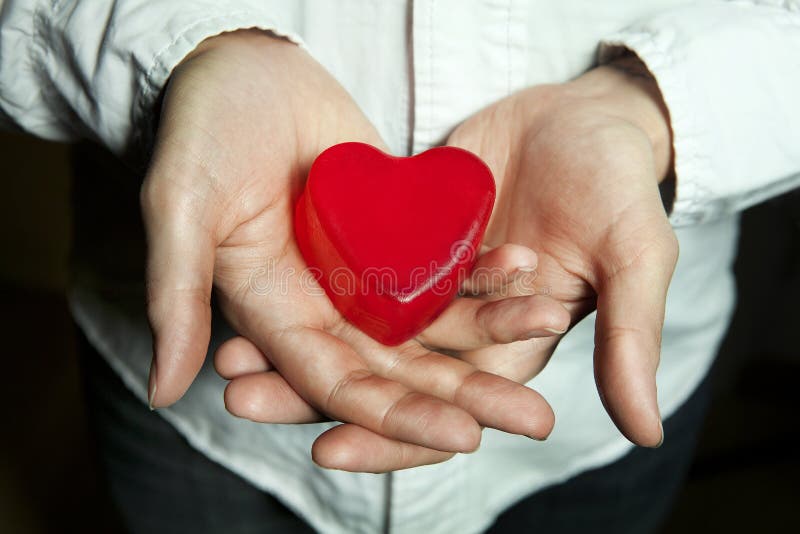 Two Hands Reach for the Heart Symbol. Stock Photo - Image of care ...