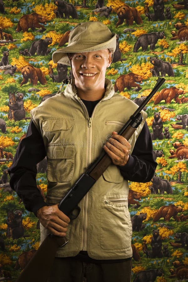 Man holding rifle. stock photo. Image of rifle, smiling - 2845778