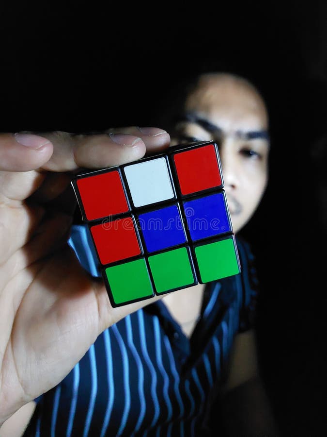 A Man Holding Rubiks Cube Isolated Editorial Stock Photo - Image of ...
