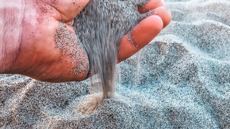 Man Holding Sand in His Hands Stock Photo - Image of arabia, sand ...