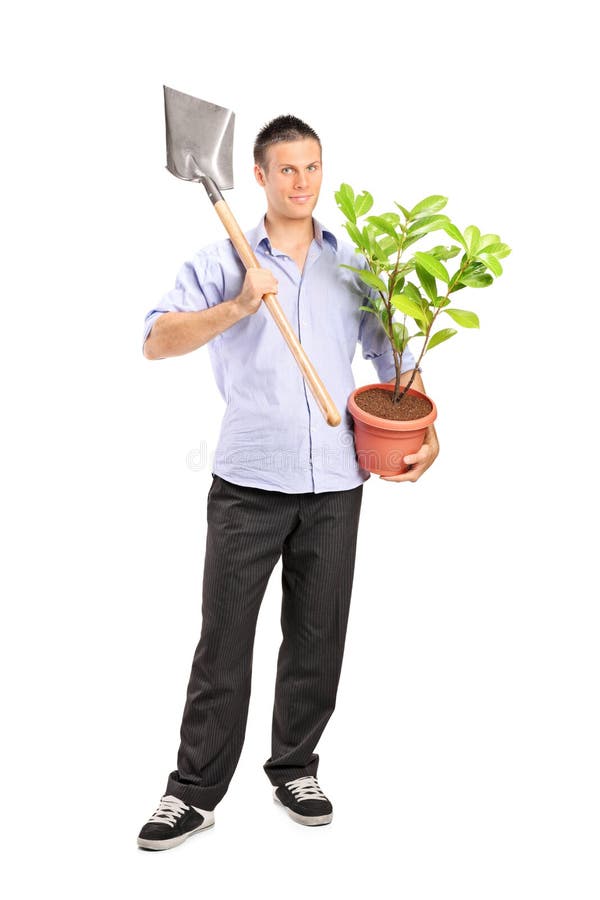 Man Holding A Shovel And A Plant Stock Photo - Image of lifestyle ...