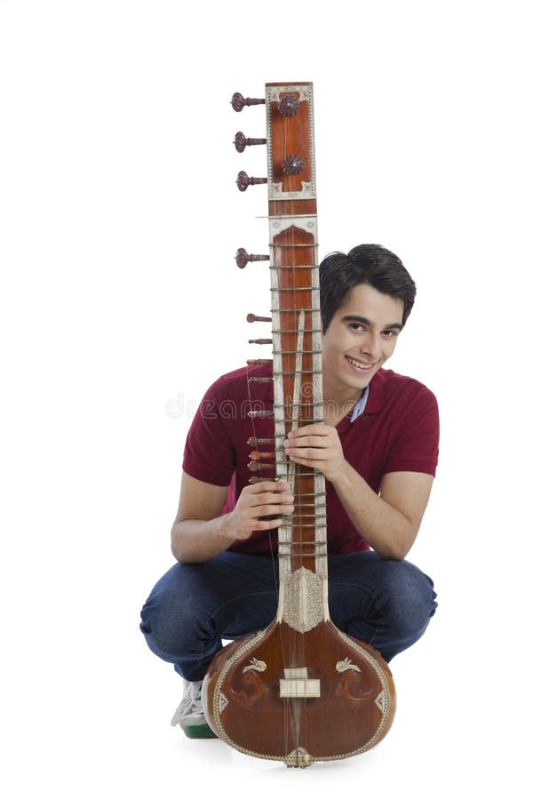 Man holding sitar stock photo. Image of person, playing - 36388326