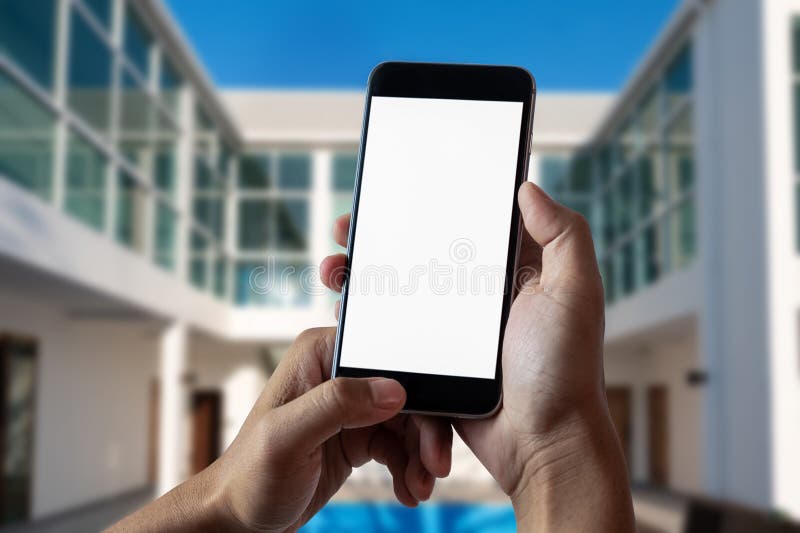 Man Holding Smartphone with Blank Screen, Close-up of Hands. Space for ...