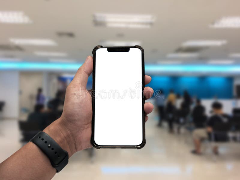 Man Holding Smartphone with Blank Screen, Close-up of Hands. Space for ...