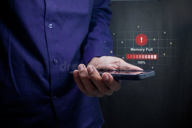 Man Holding a Smartphone with Memory Space Full Notification on Virtual ...