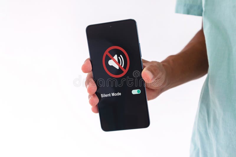 Man Holding a Smartphone with Mute Sound or Silent Mode Symbol on the ...